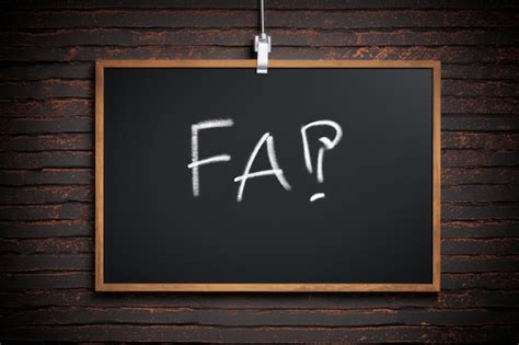 Premium Photo Exploring Frequently Asked Questions Handcrafted On A Black Chalkboard