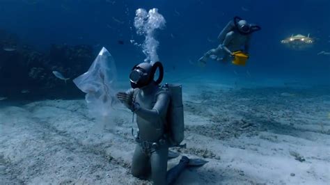 Vintage Divers In Underwater City