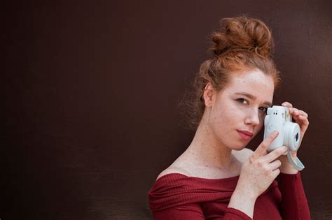 Free Photo Portrait Of Redhead Woman With Copy Space