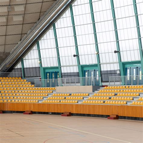 Mjma Architecture And Design Marries Wood And Mesh For Sports Centre