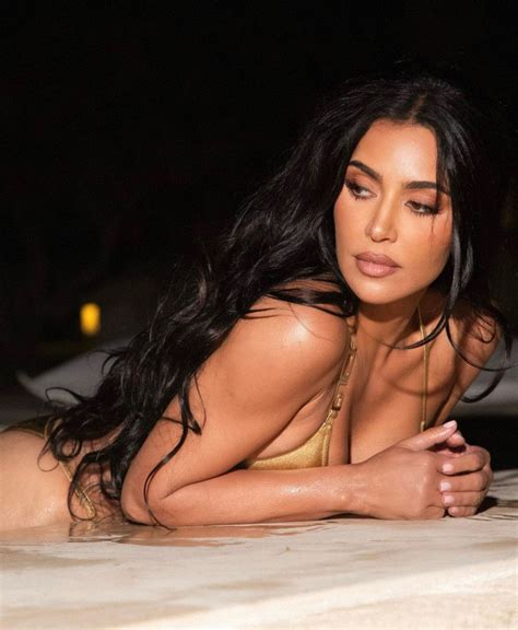 Kim Kardashian Bikes In A Gold Bikini In Sexy Night Swim Snaps