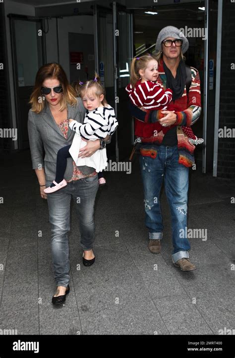 Lisa Marie Presley And Husband Michael Lockwood Carry Their Twin