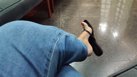 Legs Crossed And Flip Flops Dangling From The Feet 1 Goddess Foot