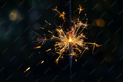 Sparkler On Black Background Premium Ai Generated Image