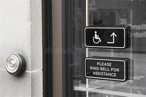 Disabled Accessible Push Button Buzzer For Assistance Sign At Building Entrance Stock Image