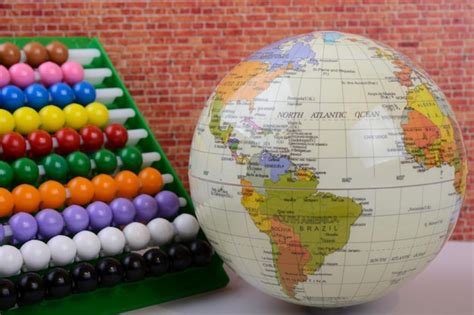 Premium Photo Globe And Abacus