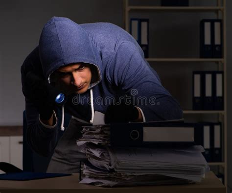 Thief Trying To Steal Personal Data In Identity Theft Concept Stock