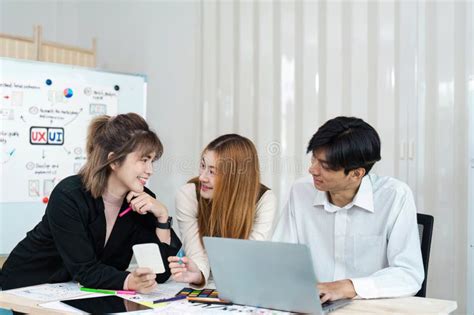 Creative Team Collaboration On Ux Ui Design Project In Modern Office