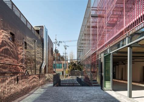 Red Mirrored Lattice Encloses Office Block By Wise Architecture