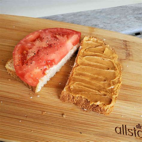 Spreading Peanut Butter On Bread