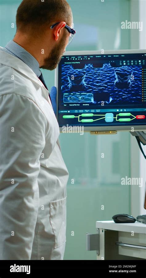 Scientist Worried About Virus Evolution Analysing Dna Scan Image