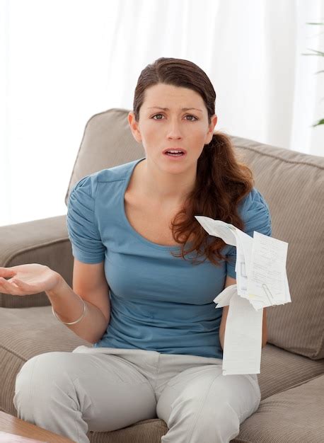 Premium Photo Worried Woman Misunderstanding Her Bills Sitting In The