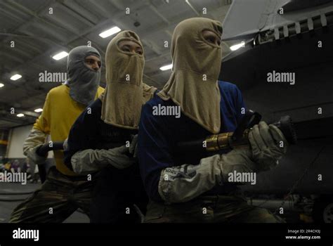 Us Navy Crew Members Fight A Simulated Class Alpha Fire During A General Quarters Gq Drill In