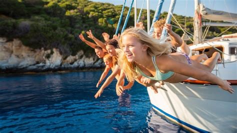 A Group Of Women Are On A Boat With A Rope That Says Snorkel Premium