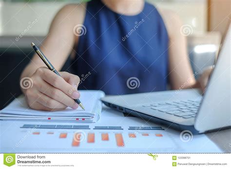 Businesswoman Using Laptop For Analysis Maketing Plan Stock Image