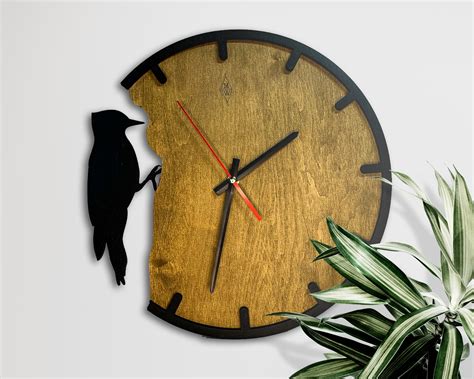 Oval Wall Clock With Bird At Jordan Arcelia Blog