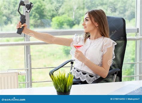 Woman Vlogger Recording Business Vlog At Office Desk Stock Image