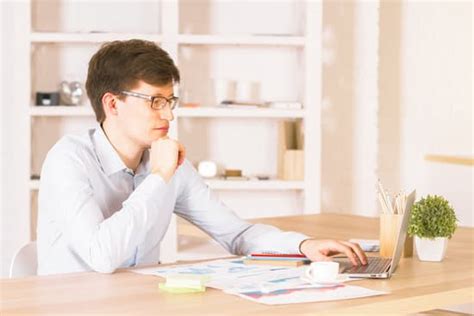 man using notebook photos by canva