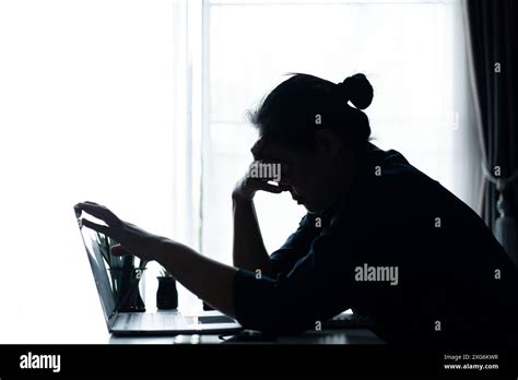 Businesswoman Faced Challenging Problem At Office Navigating Work Stress And Using Her Computer