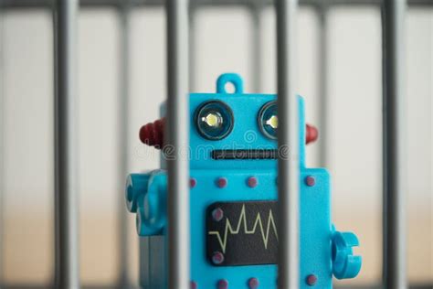 Close Up Ai Artificial Intelligence Bot In Jail With White Wall