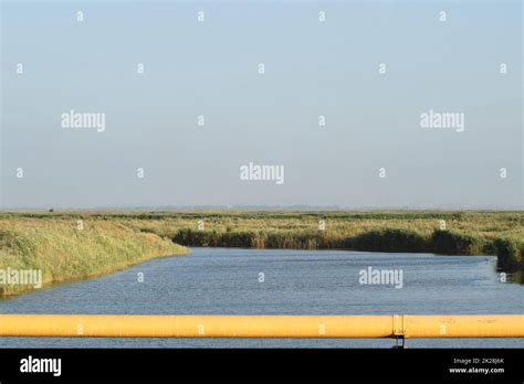 The Gas Pipeline Through The Small River Stock Photo Alamy