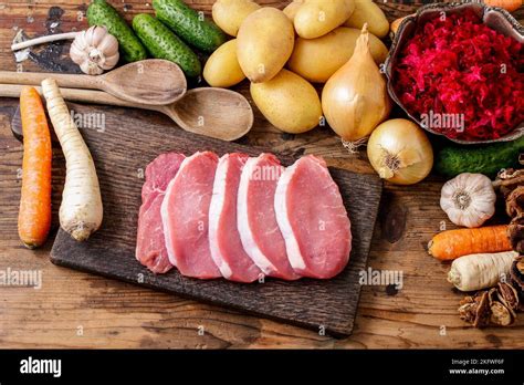 Different Kinds Of Meat And Vegetables On Wooden Table Cooking Time Stock Photo Alamy