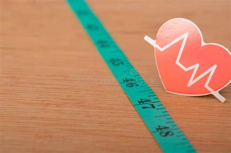 Heartbeat Rate Symbol And Measuring Tape Keeping Track Of Your Heart Rate Provides You With