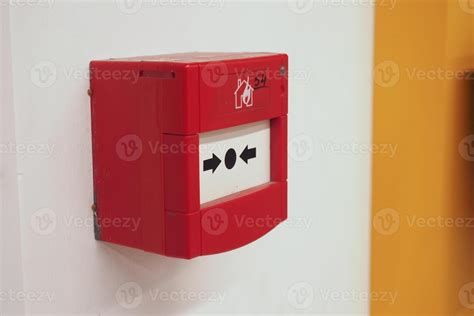 Red Fire Alarm Button On Wall Stock Photo At Vecteezy